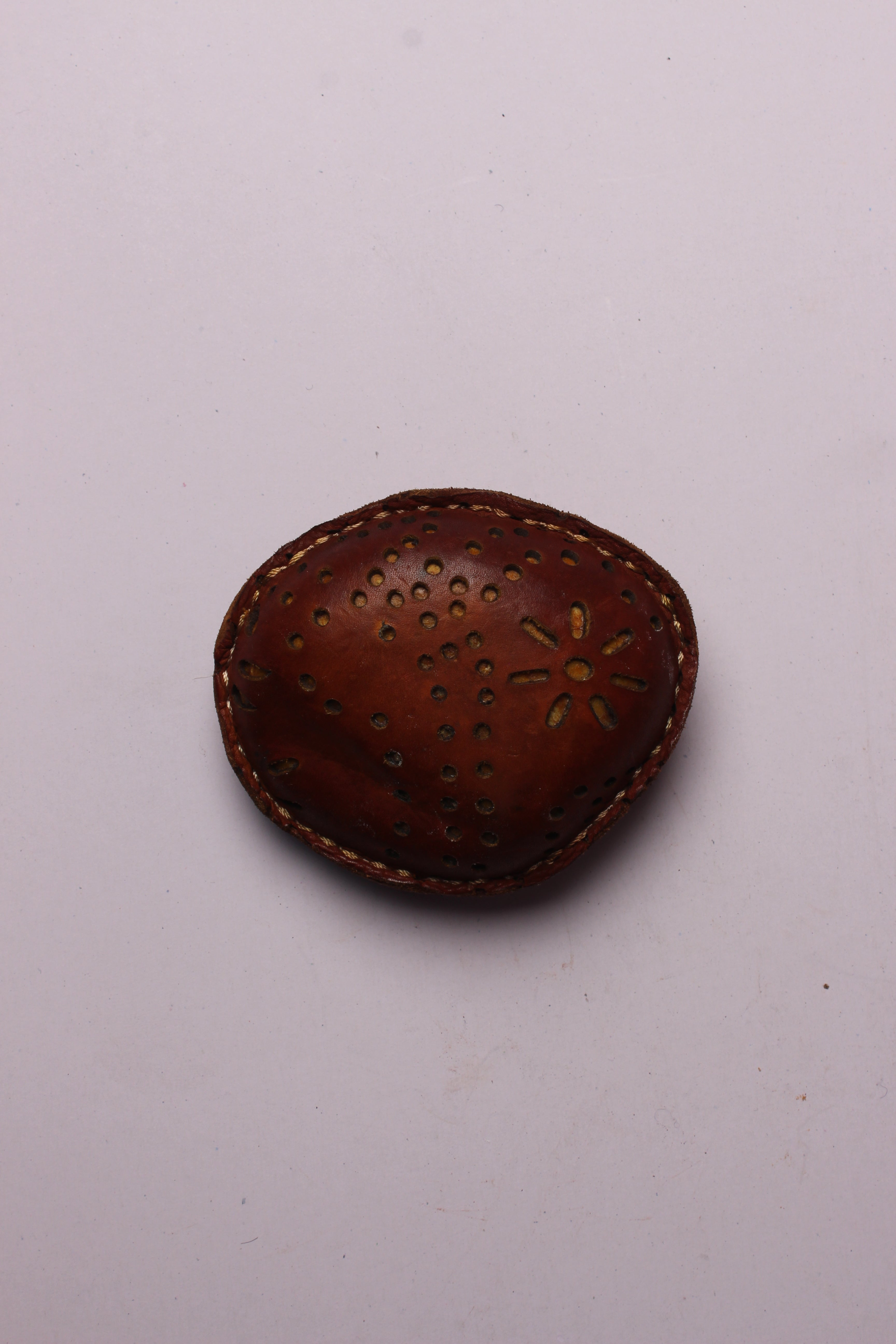 Precision Elegance: Laser-Cut Leather Paperweight