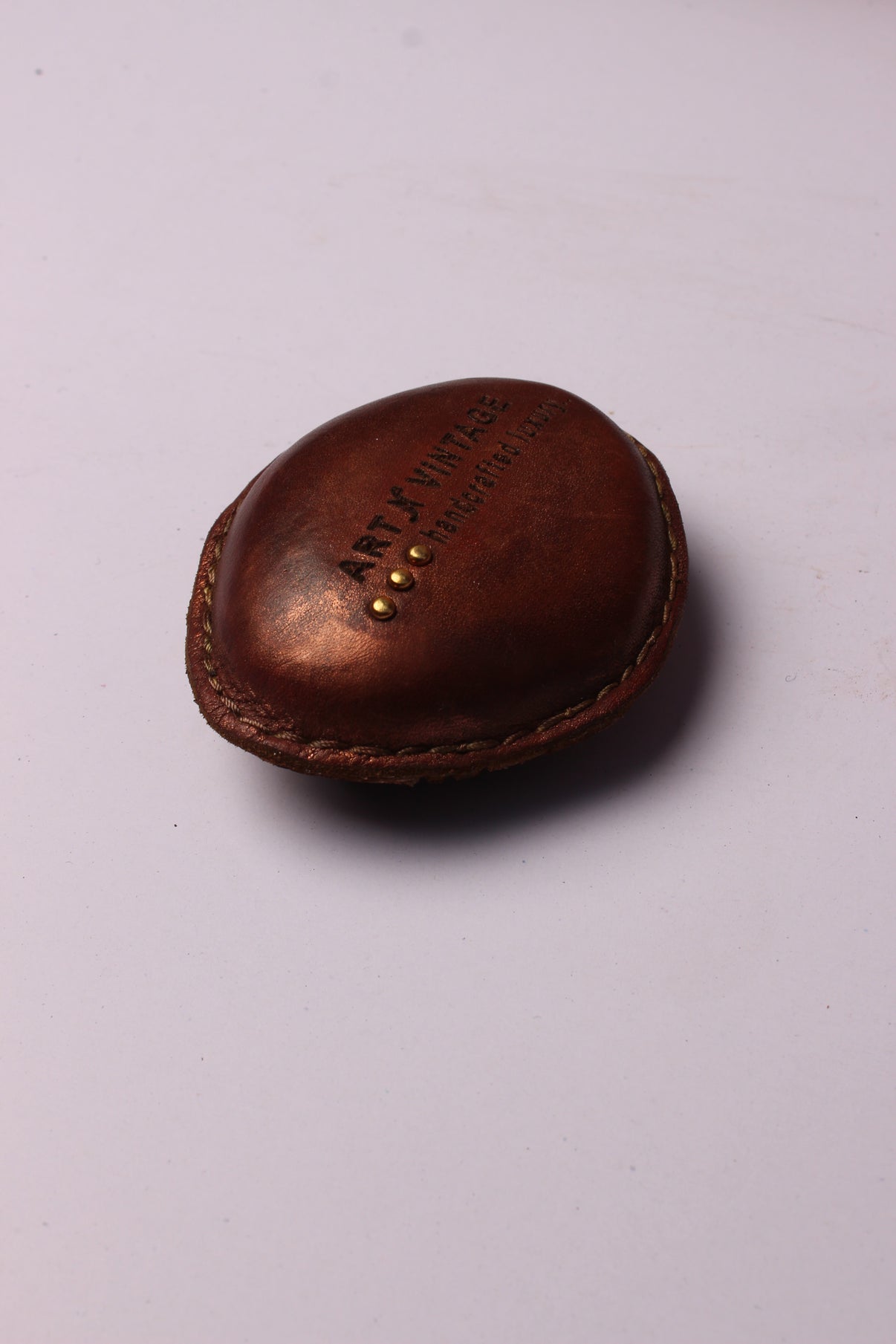 Precision Elegance: Laser-Cut Leather Paperweight